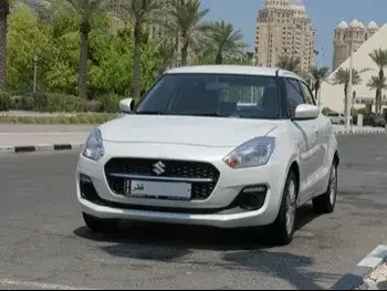 Suzuki Swift White Sedan For Rent in Qatar
