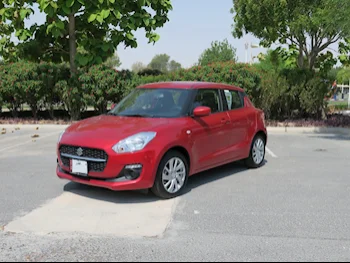 Suzuki Swift Red Hatchback For Rent in Qatar
