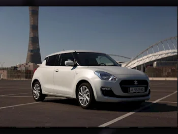 Suzuki Swift White Hatchback For Rent in Qatar
