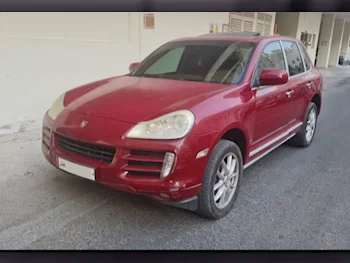 Porsche Cayenne Maroon 2009 For Sale in Qatar